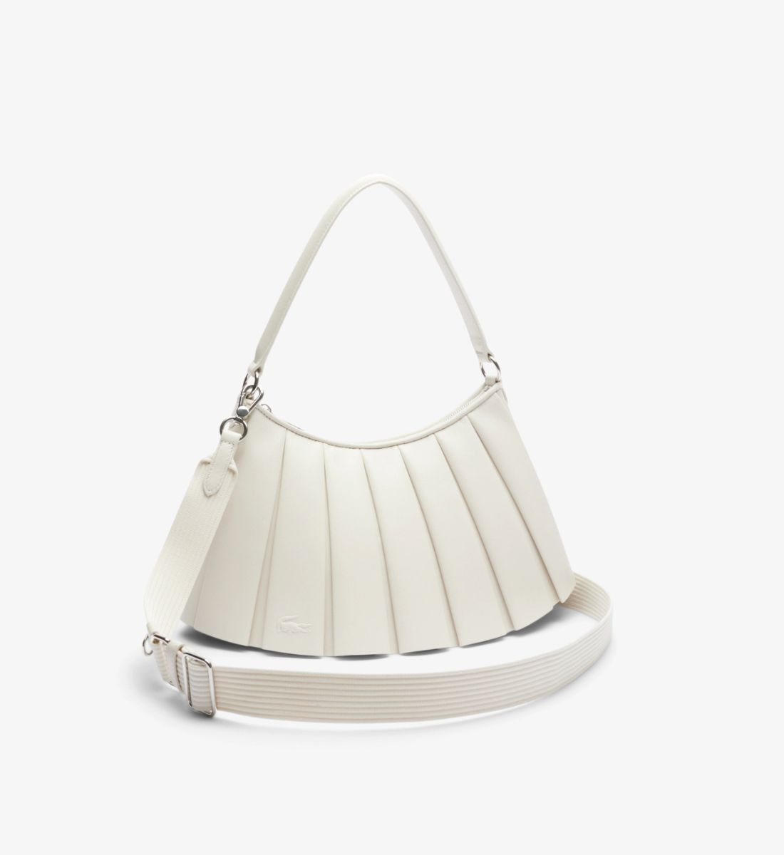 Lacoste’s New Lenglen Bag Promises Pleats, Purpose, And Poise